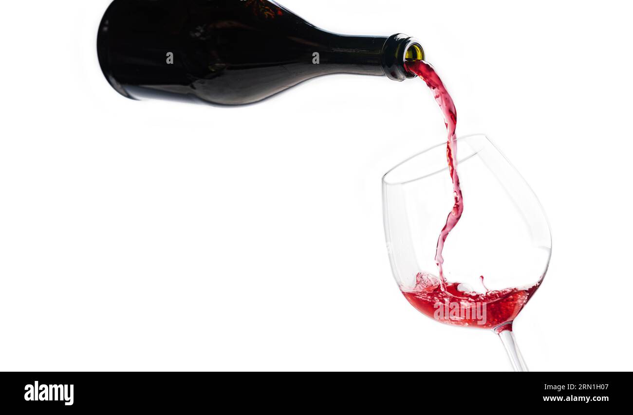 Pouring white wine Stock Photo - Alamy