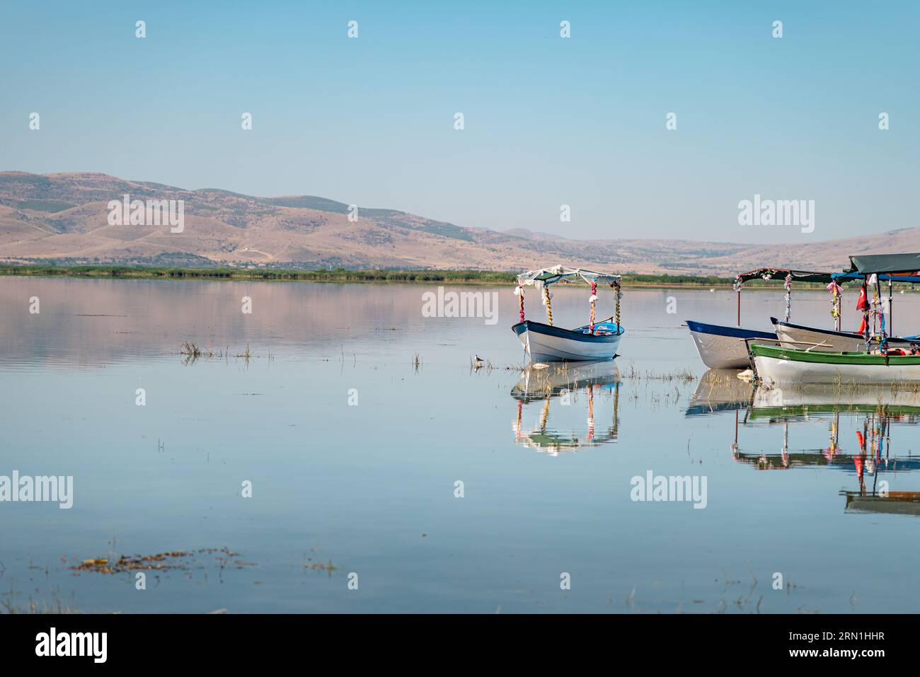 Decorated excursion boats in Isikli lake in Civril, Denizli Stock Photo ...