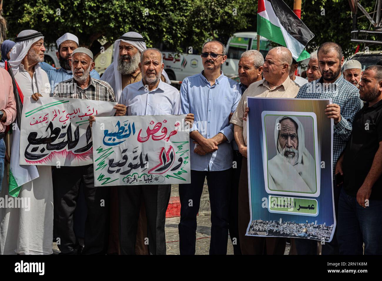 Gaza, Gaza, Palestine. 30th Aug, 2023. Palestinian men raise banners of ...
