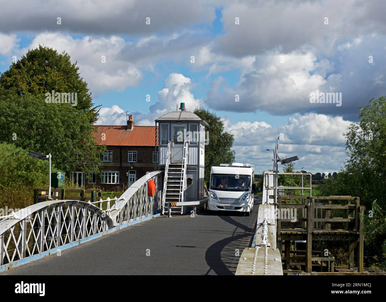 Hymer motorhome crossing the swing bridge across the River Ouse at ...