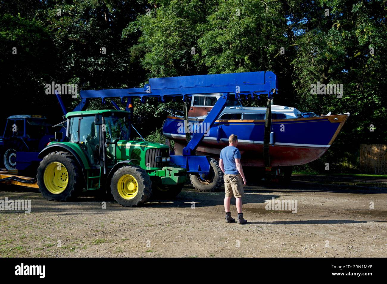 Boat being launched, by tractor, onto the River Ouse, at Acaster Maine ...