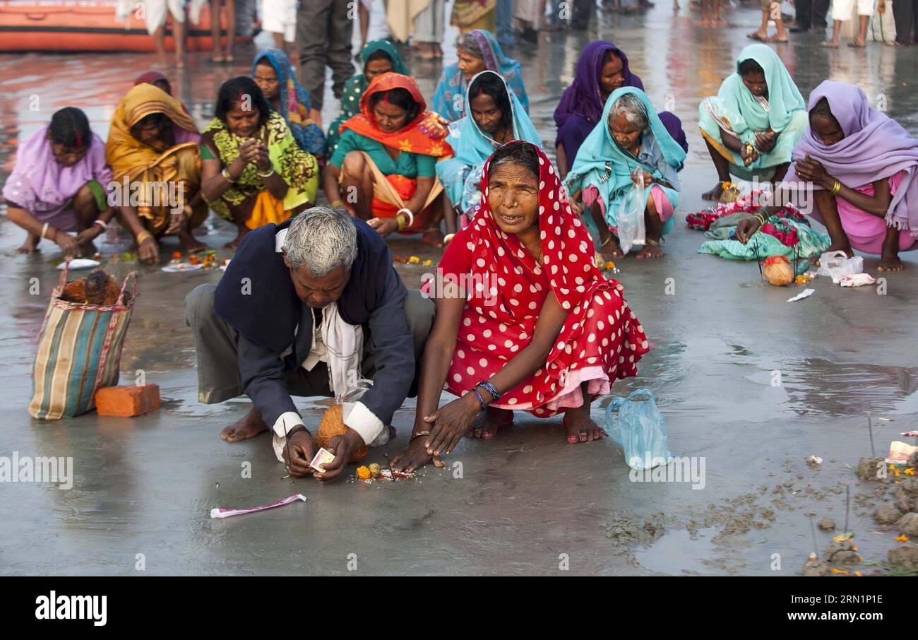 Hindu devotees take holy dip hi-res stock photography and images - Alamy