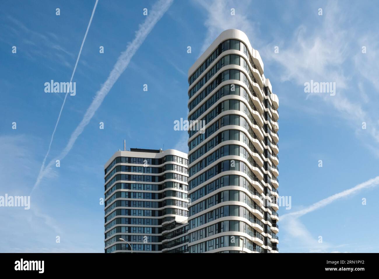 Modern corporate buildings against the blue sky. High-rise buildings in ...