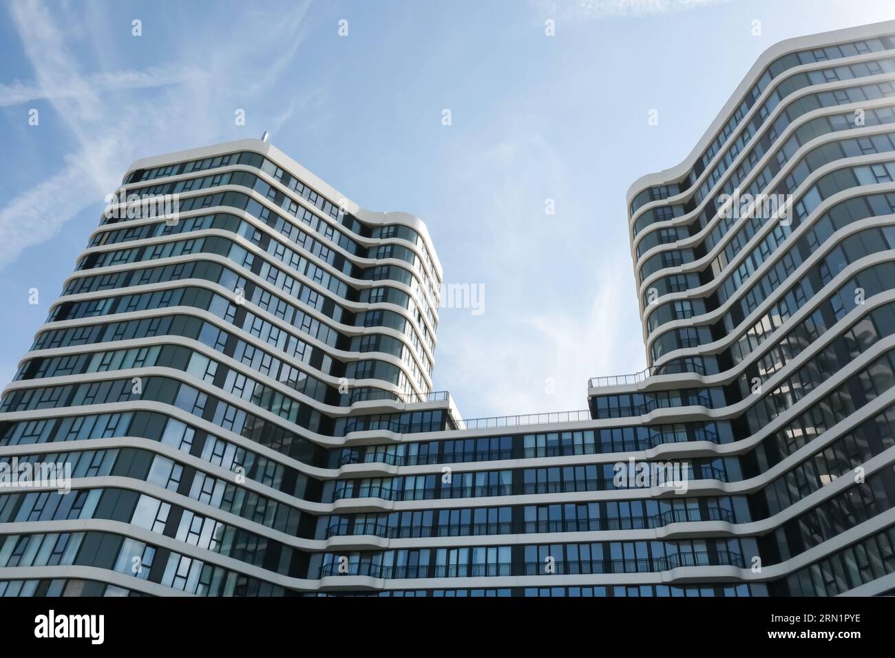 Modern corporate buildings against the blue sky. High-rise buildings in ...