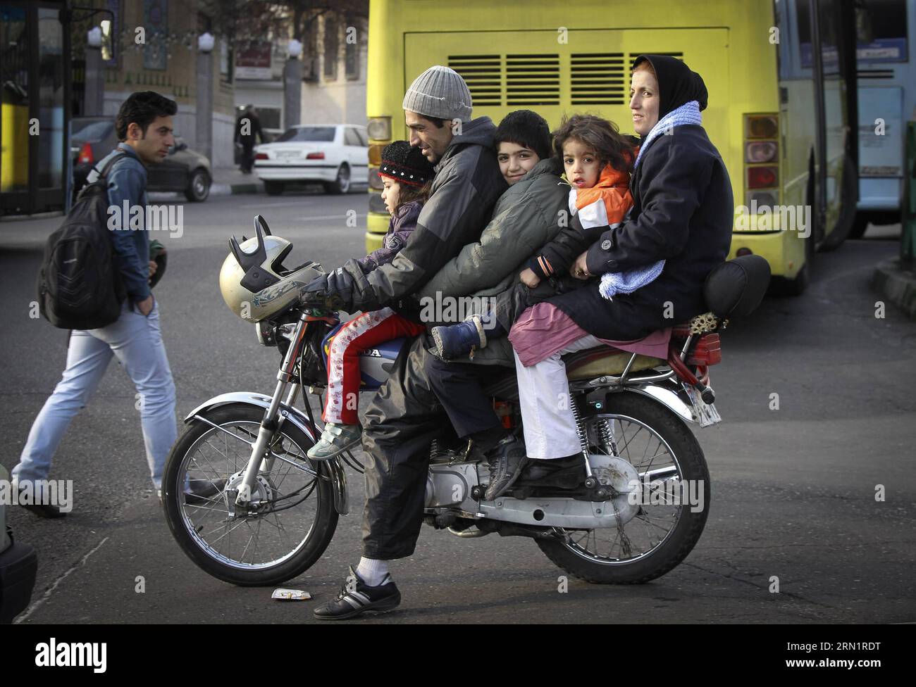 Iranian family on motorcycle in hi-res stock photography and images - Alamy