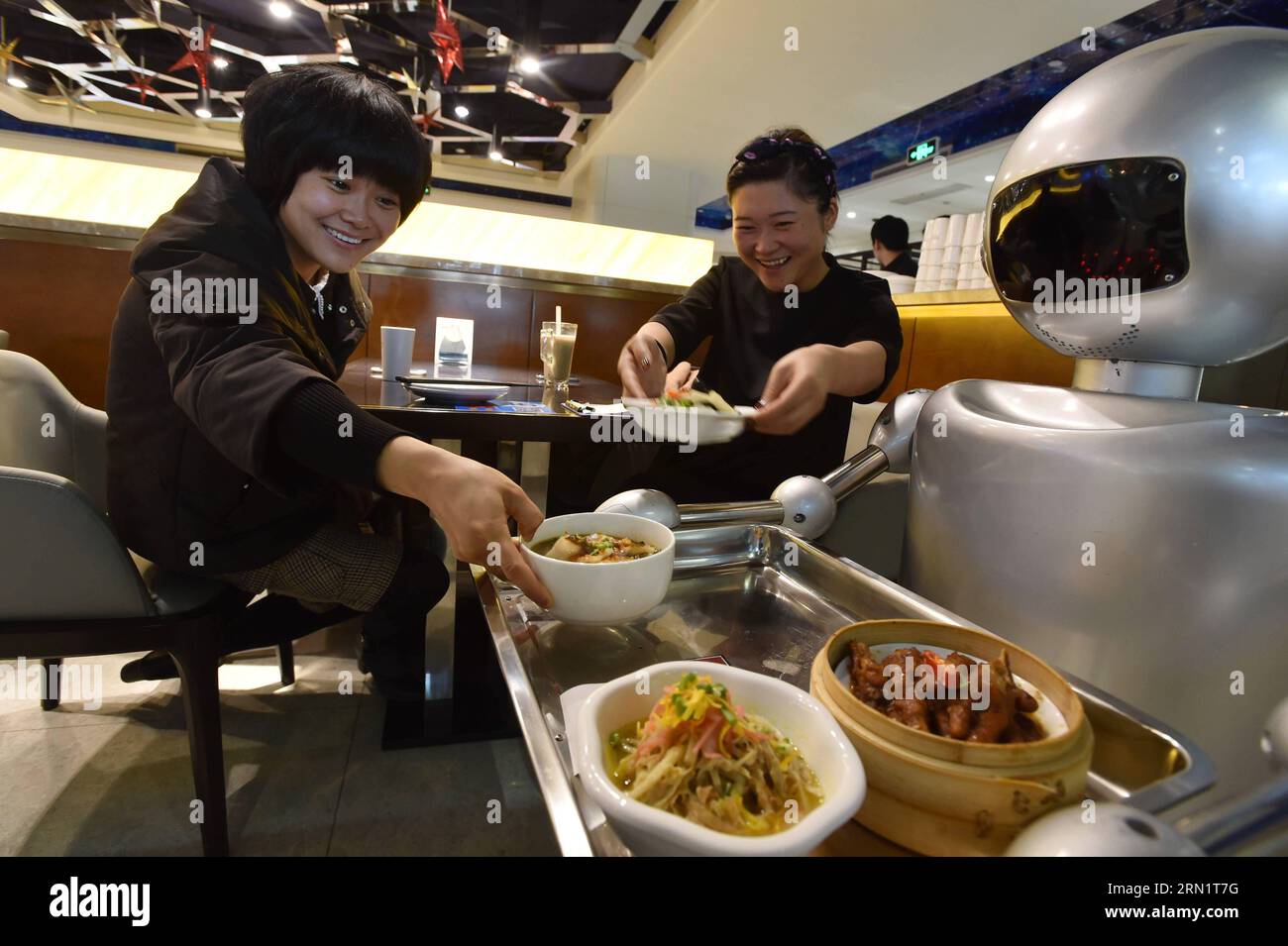 Robot waiter at restaurant hi-res stock photography and images - Alamy