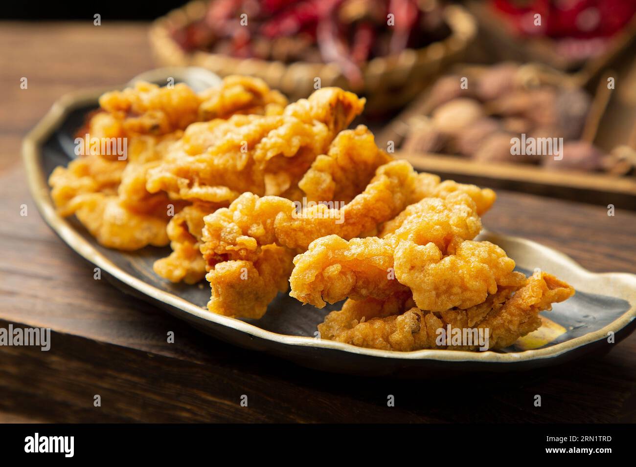 Chinese food:Deep fried pork belly，Sichuan snacks Stock Photo - Alamy