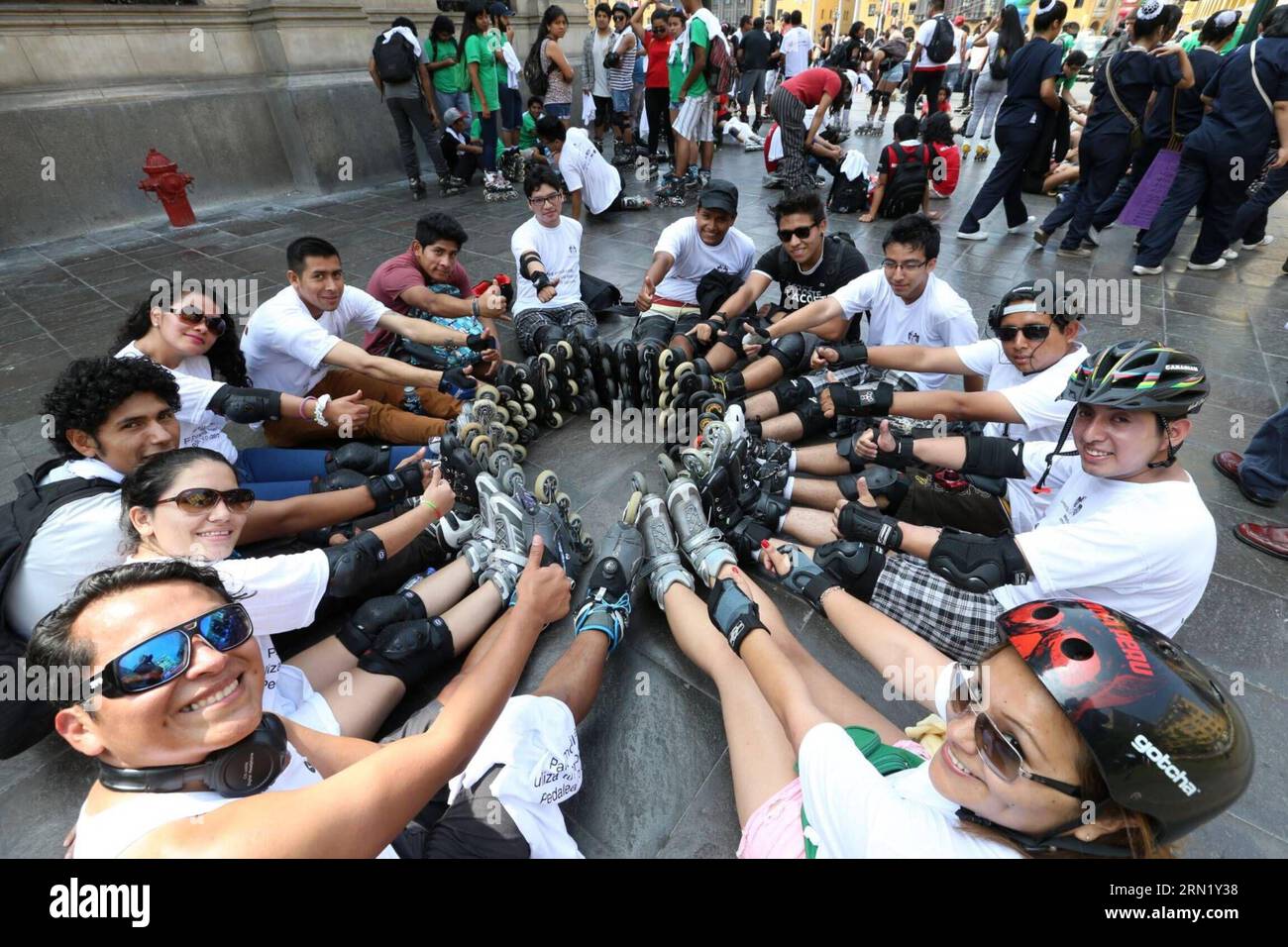 (150125) -- LIMA, Jan. 25, 2015 -- Residents take part in a bike ride ...