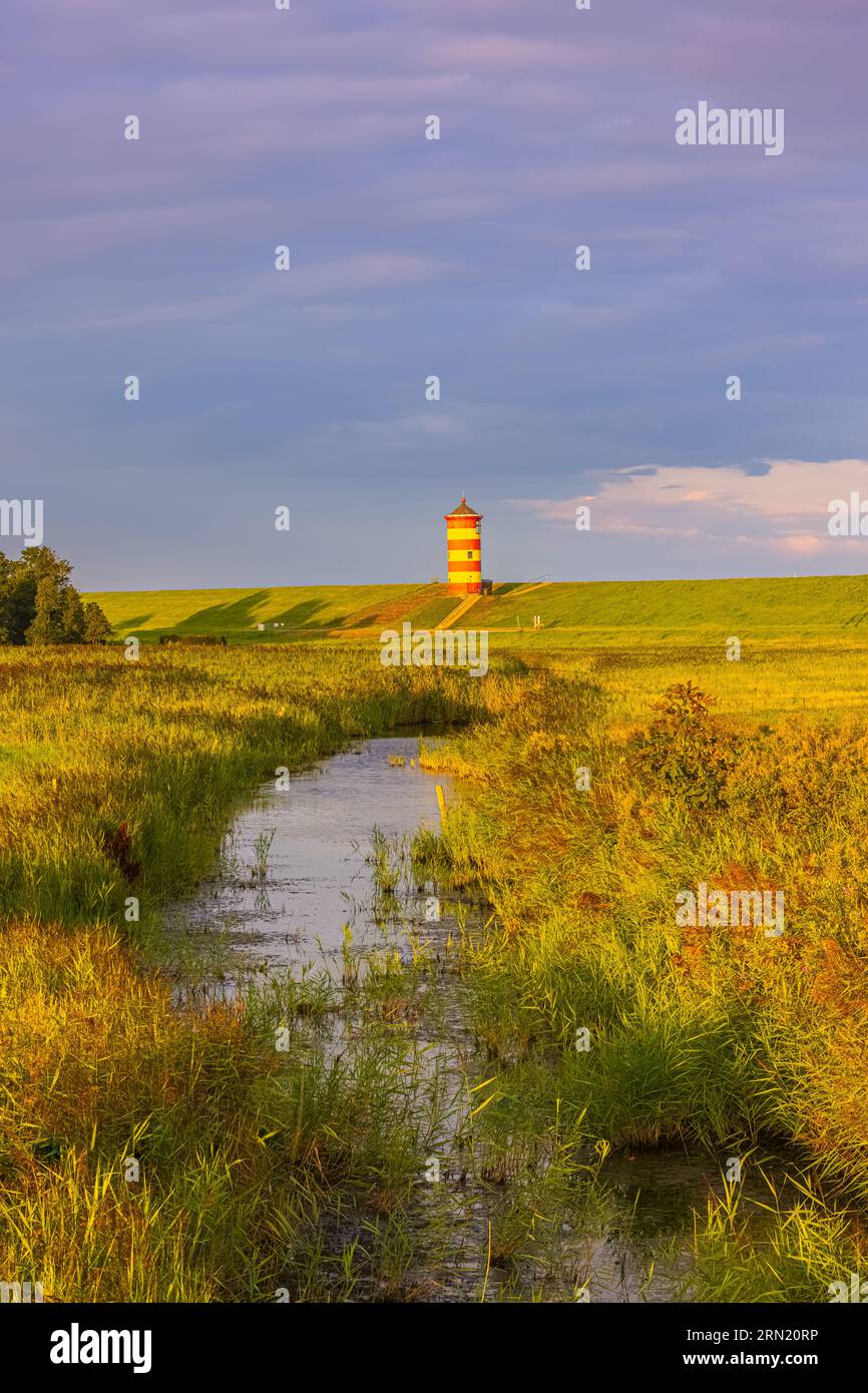 A vertical photo from a lovely summer morning at the lighthouse of ...