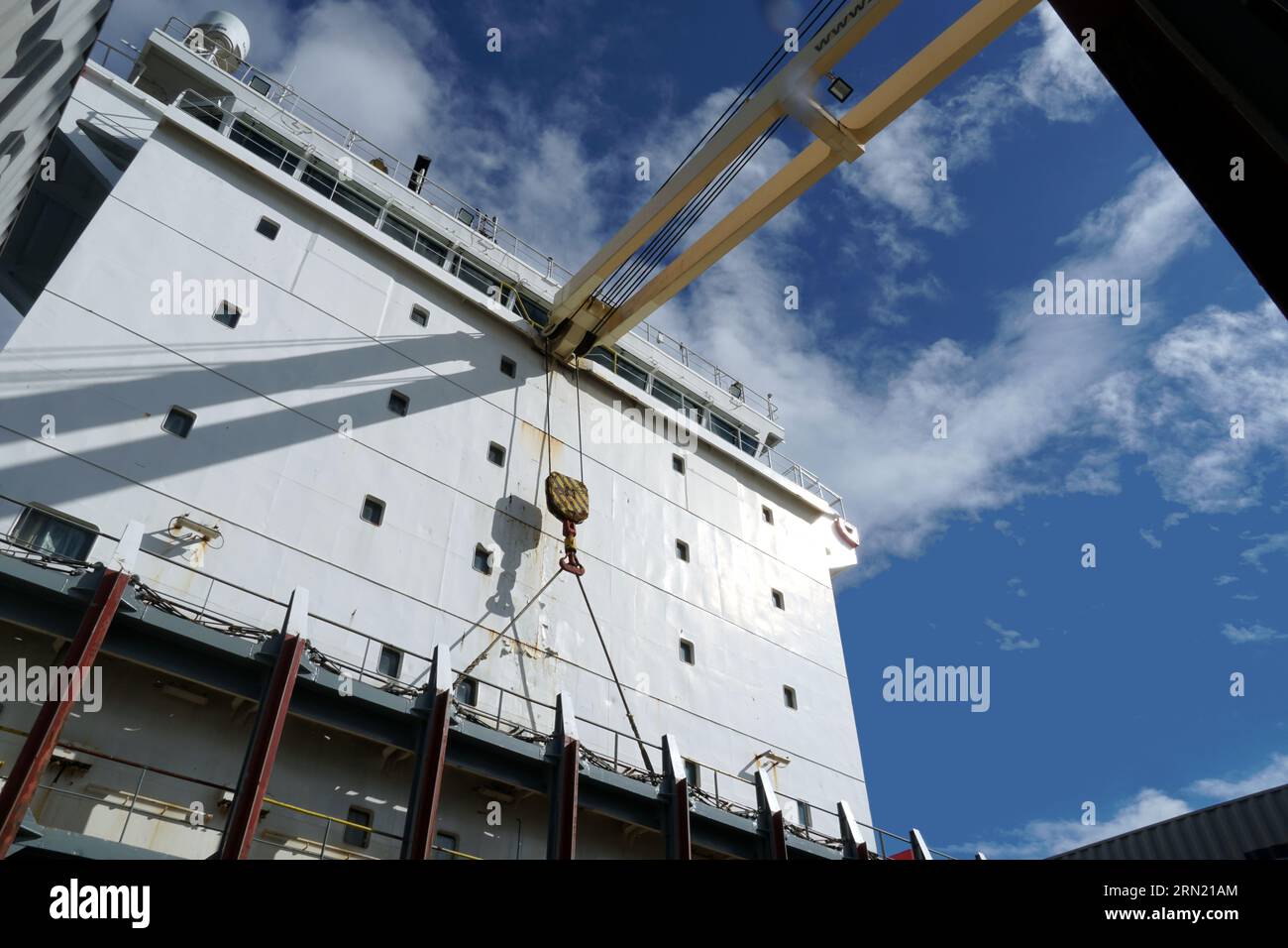 White superstructure with navigational bridge on the merchant container ...