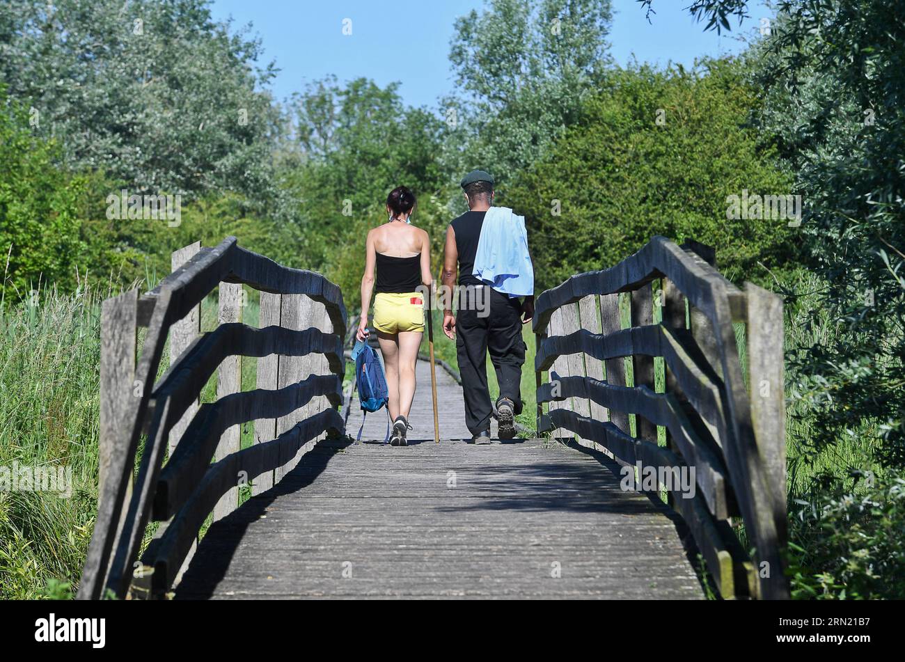 Clairmarais (northern France): two people having a walk in the Etangs ...