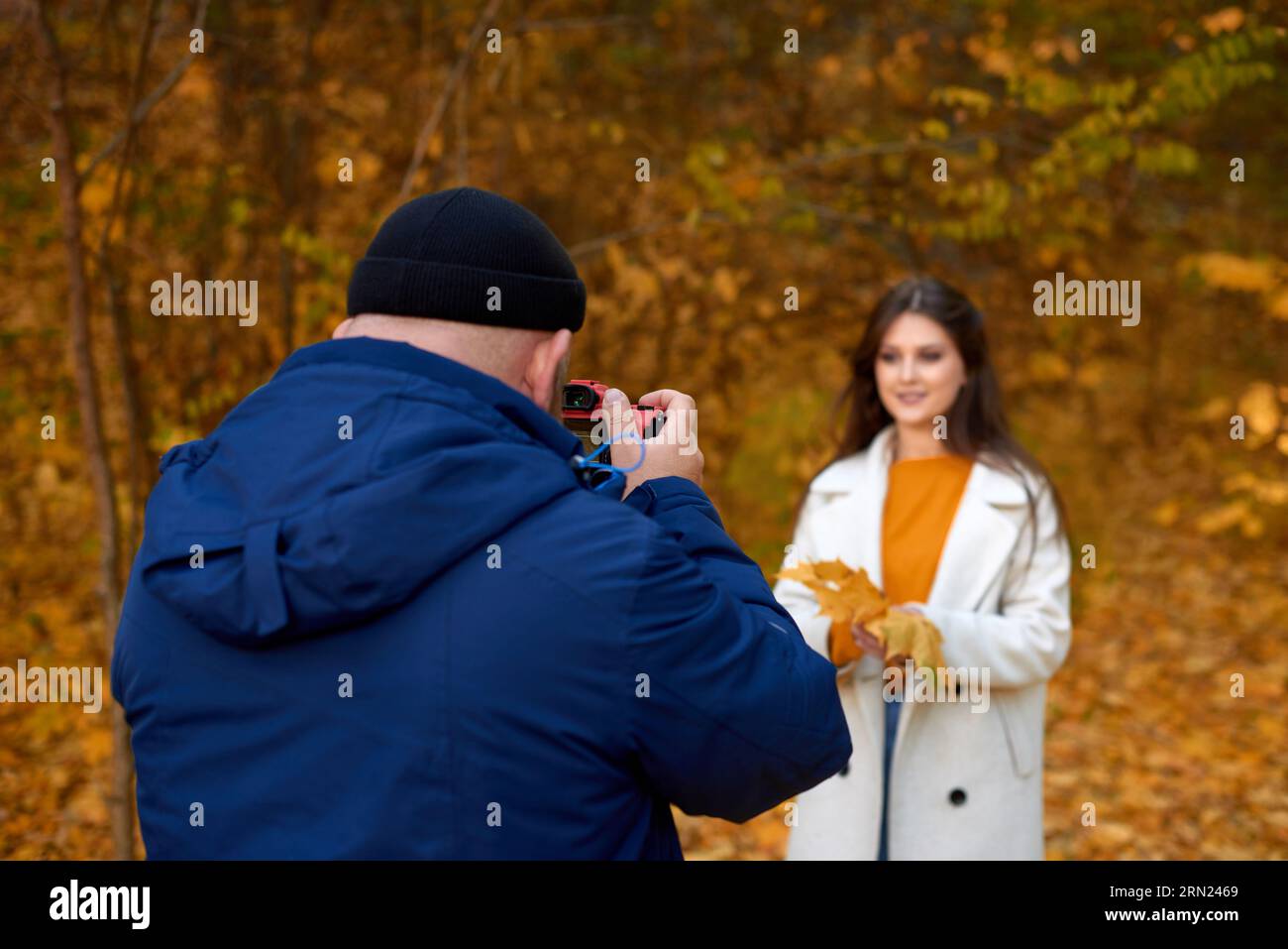 professional reportage photo shooting for social networks in fall park ...