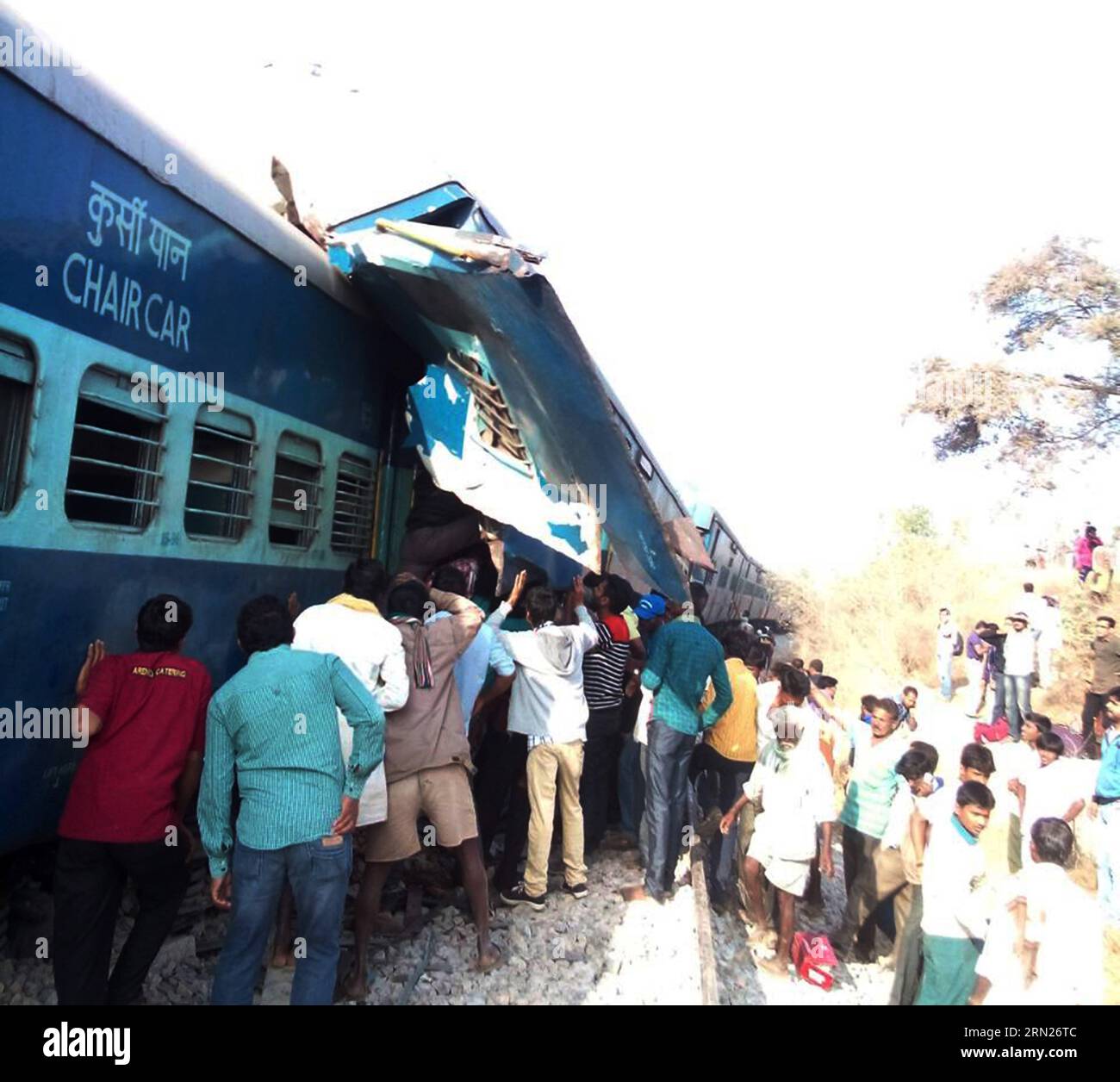 (150213) -- BANGALORE, Feb. 13, 2015 -- Rescuers cut the outer shell of a crumbled compartment ...
