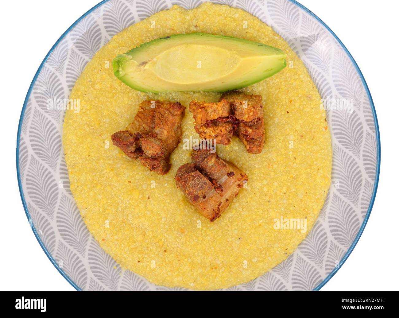 Cooked corn flour with pork meat and avocado. Cuban cuisine Stock Photo ...
