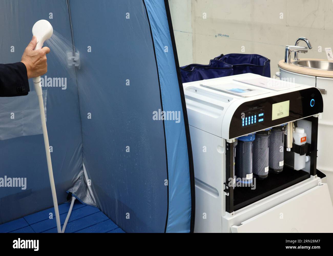 Tokyo, Japan. 31st Aug, 2023. Japan's water processing venture Wota displays the company's water ...