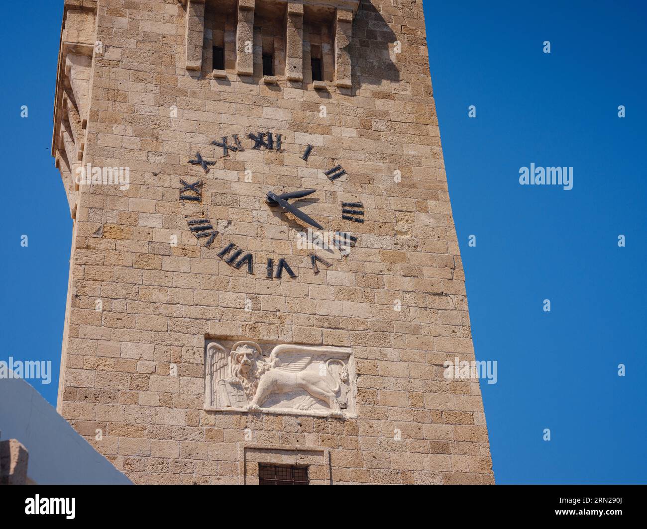 Travel to Greece, Mediterranean islands Rhodes. medieval tower clock ...