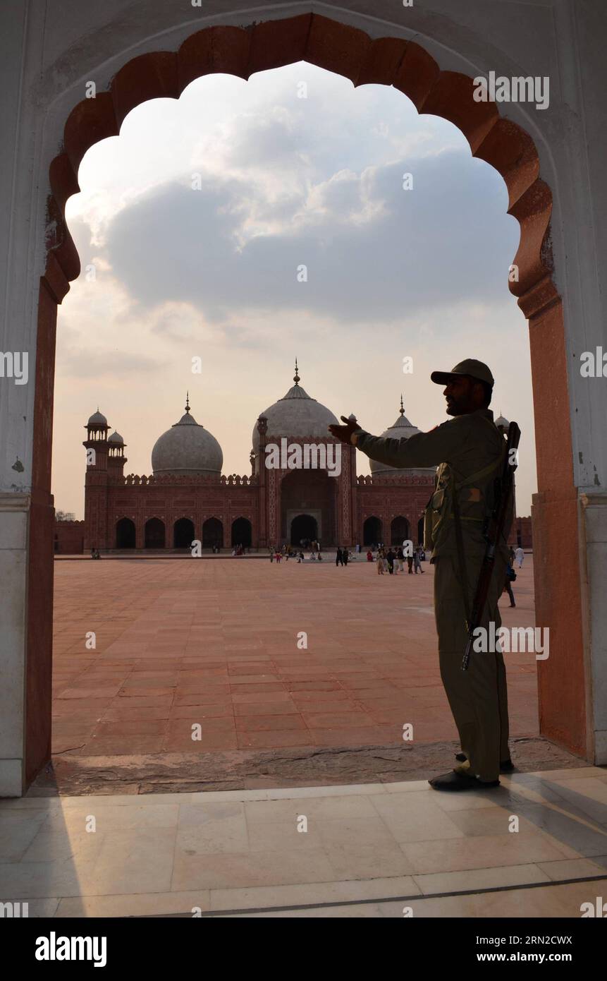 LAHORE, Feb. 27, 2015 -- A security guard stands at the Badshahi Mosque ...