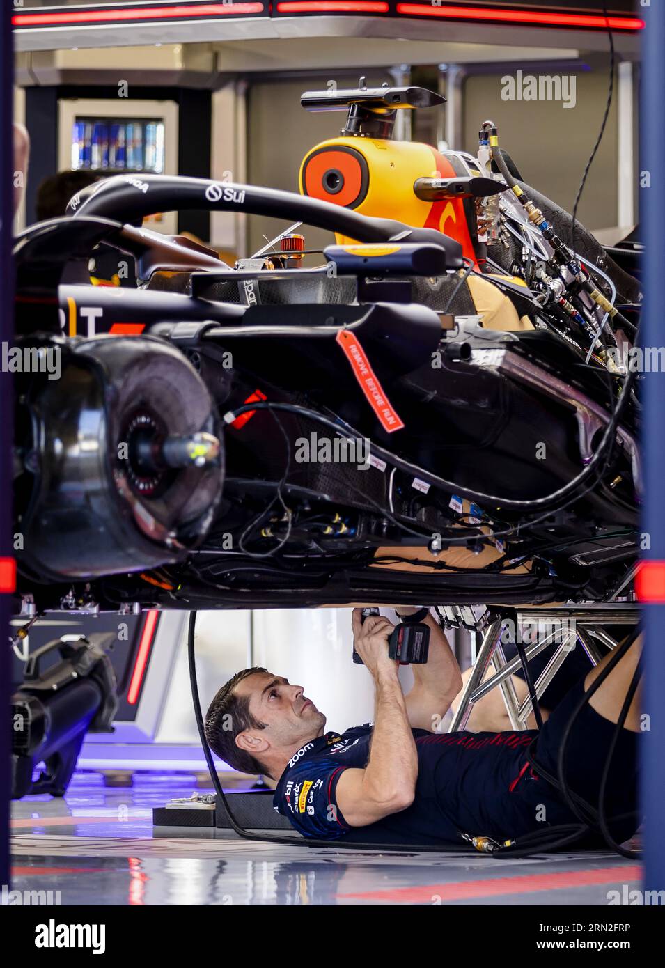 MONZA - 31/08/2023, MONZA - A mechanic works on Max Verstappen's (Red ...