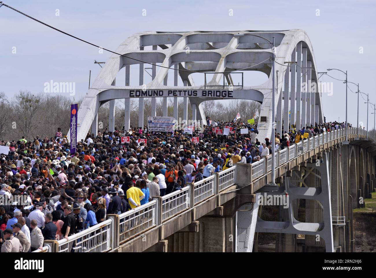 (150309) -- SELMA, March 8, 2015 -- Tens of thousands of people walk ...