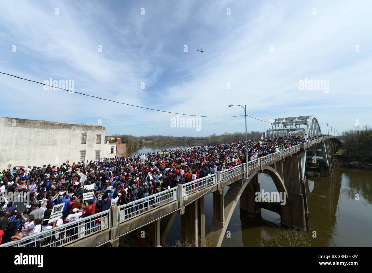 (150309) -- SELMA, March 8, 2015 -- Tens of thousands of people walk ...
