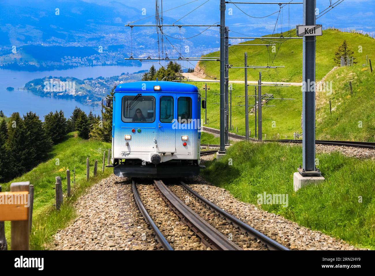 Great close-up view of the blue cogwheel railway train ascending the ...