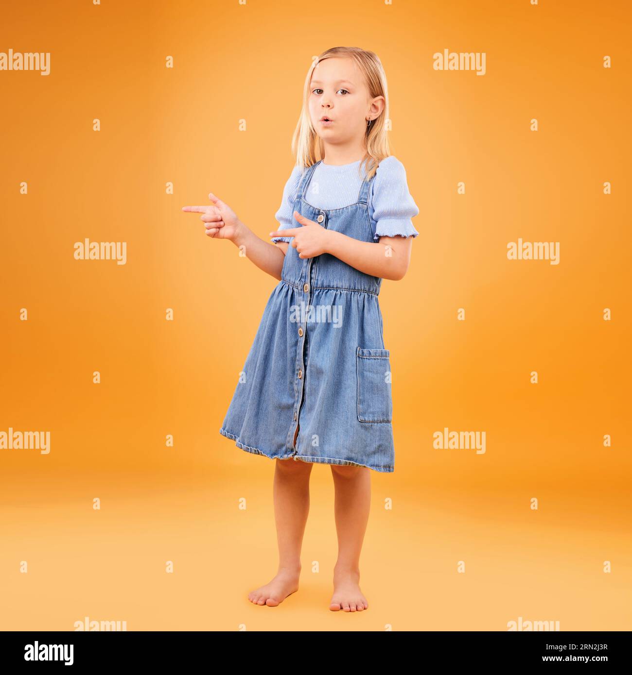 Girl, portrait and child with finger gun in studio for advertising ...