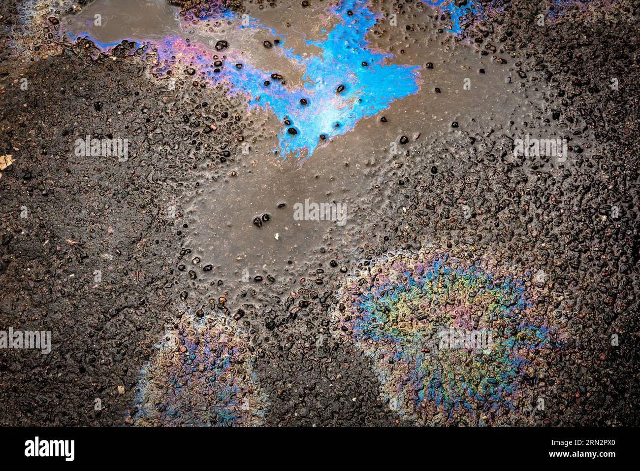 Oil slick in parking lot hi-res stock photography and images - Alamy