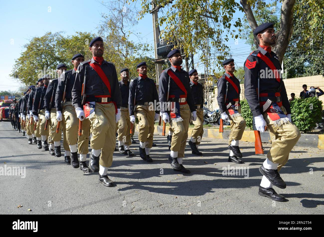 (150323) -- LAHORE, March 23, 2015 -- Pakistani policemen march during ...