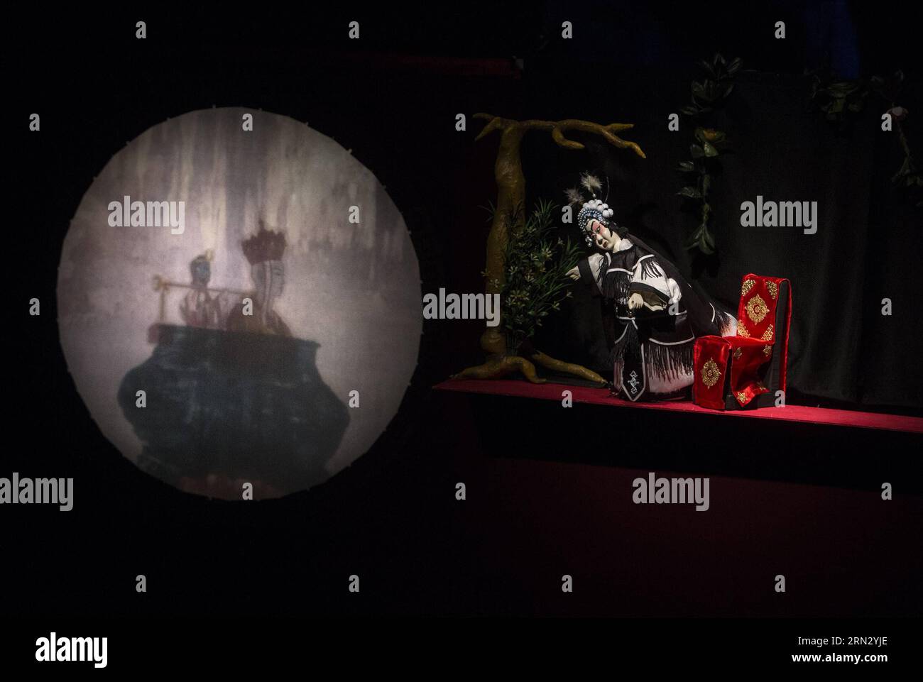 Puppeteers represent a scene of Chinese Traditional Puppet Show Monkey ...
