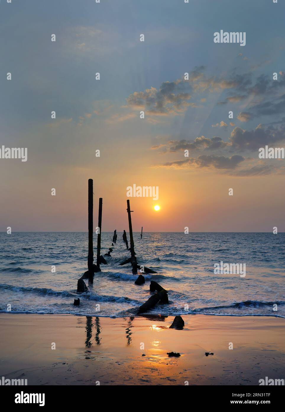 Evening sunset in blue sky, dawn at the beach with silhouette of ...
