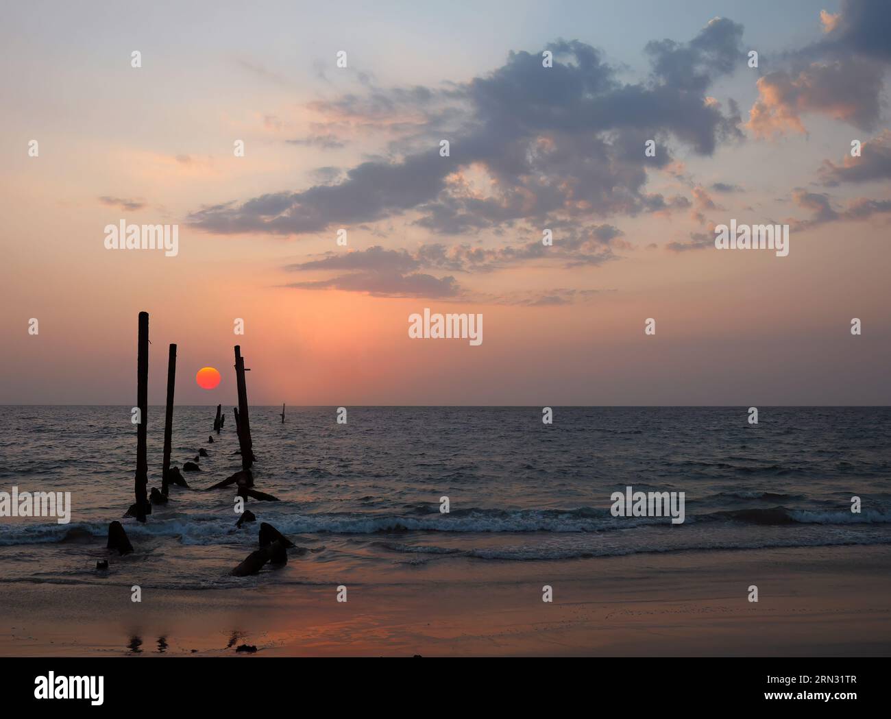 Evening sunset in blue sky, dawn at the beach with silhouette of ...