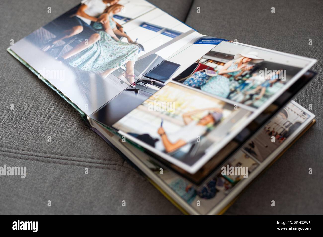close up. photo book binding. storing photos from a photo session in a ...