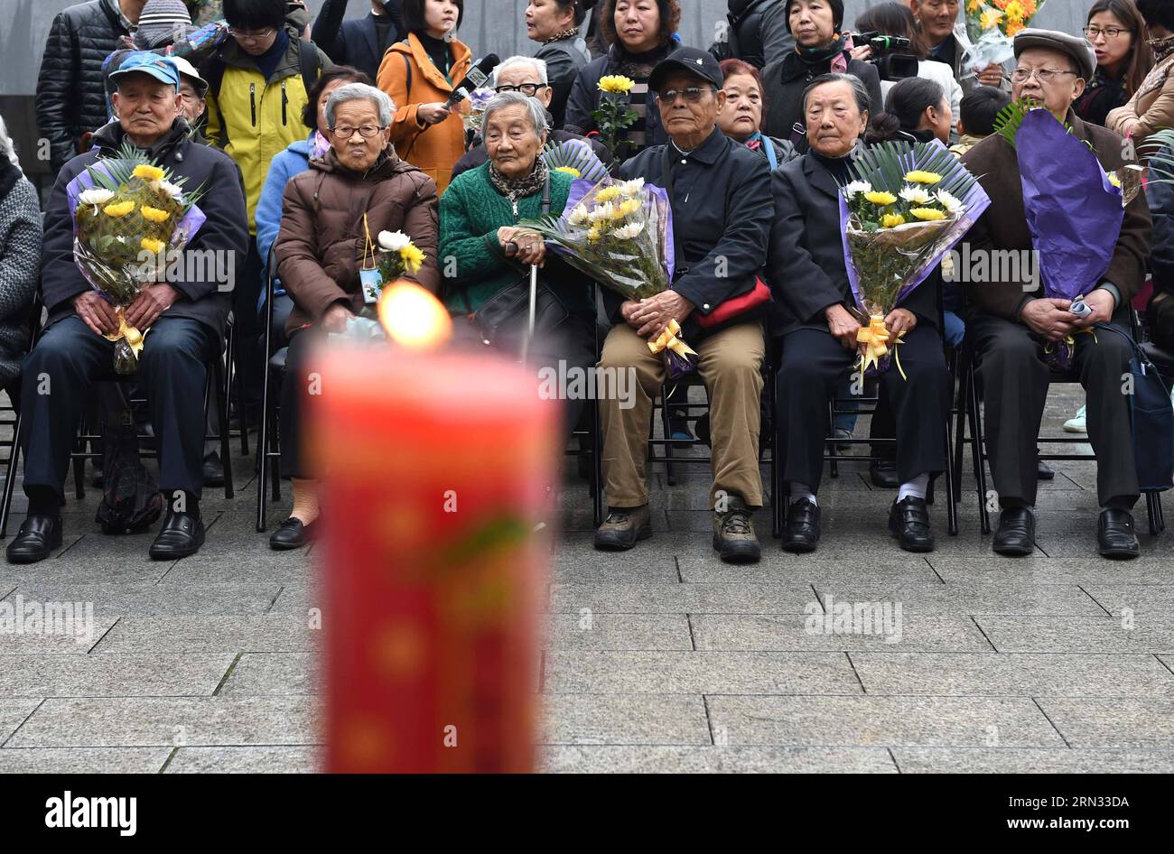 Survivors (front row) and relatives of victims of Nanjing Massacre take ...
