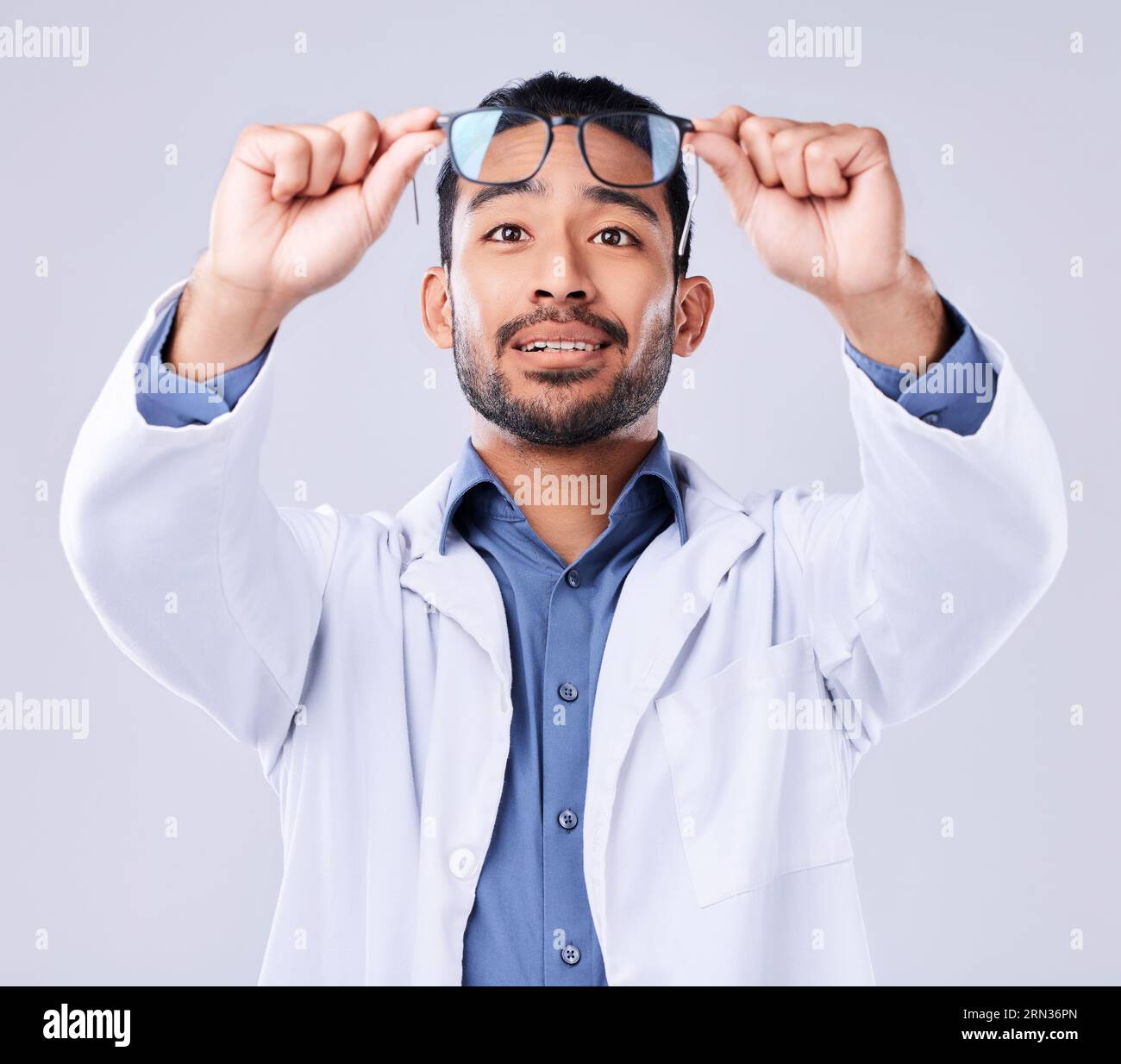 Man, glasses and vision of ophthalmologist at studio isolated on a ...