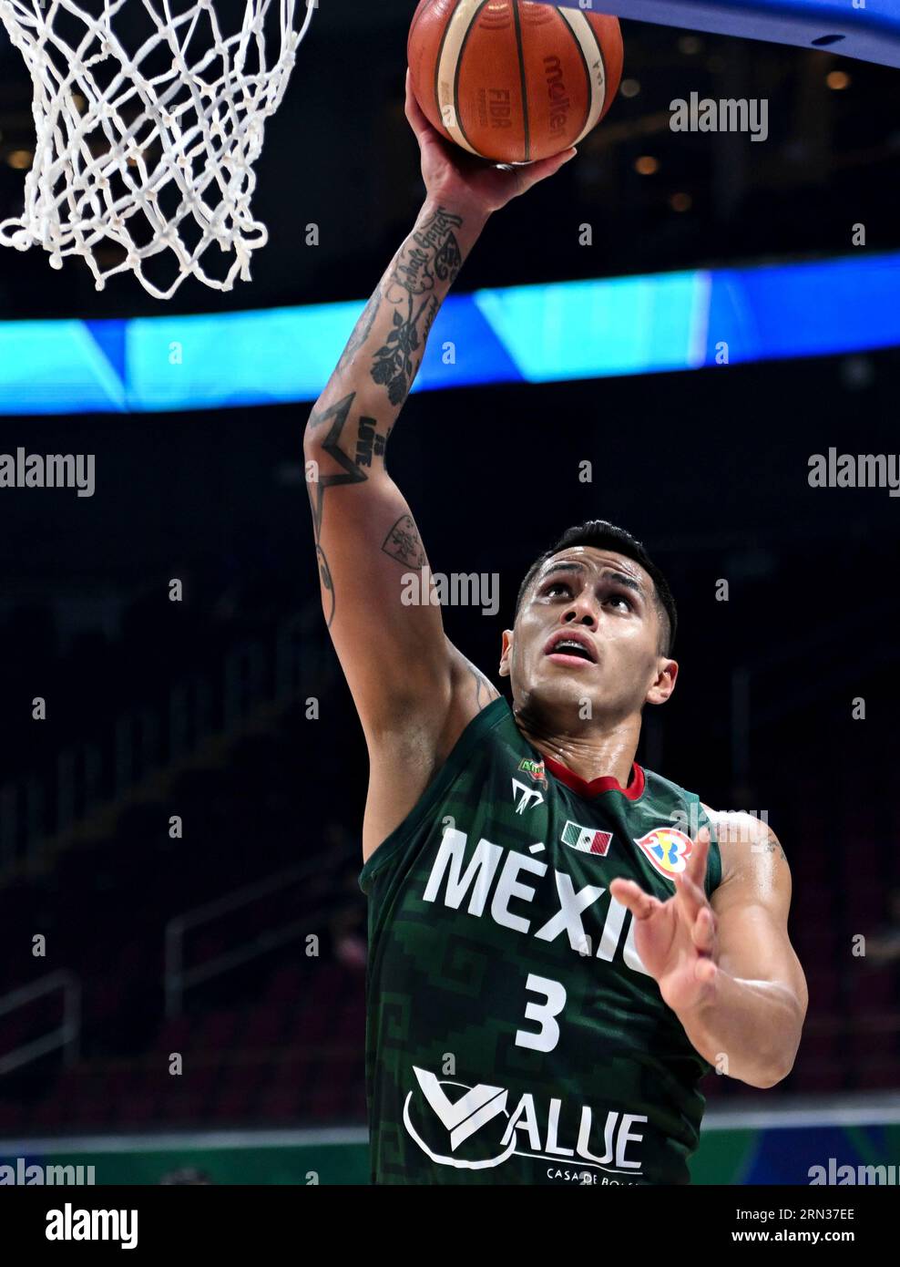 MANILA, Aug. 31, 2023 (Xinhua) -- Fabian James of Mexico dunks during ...
