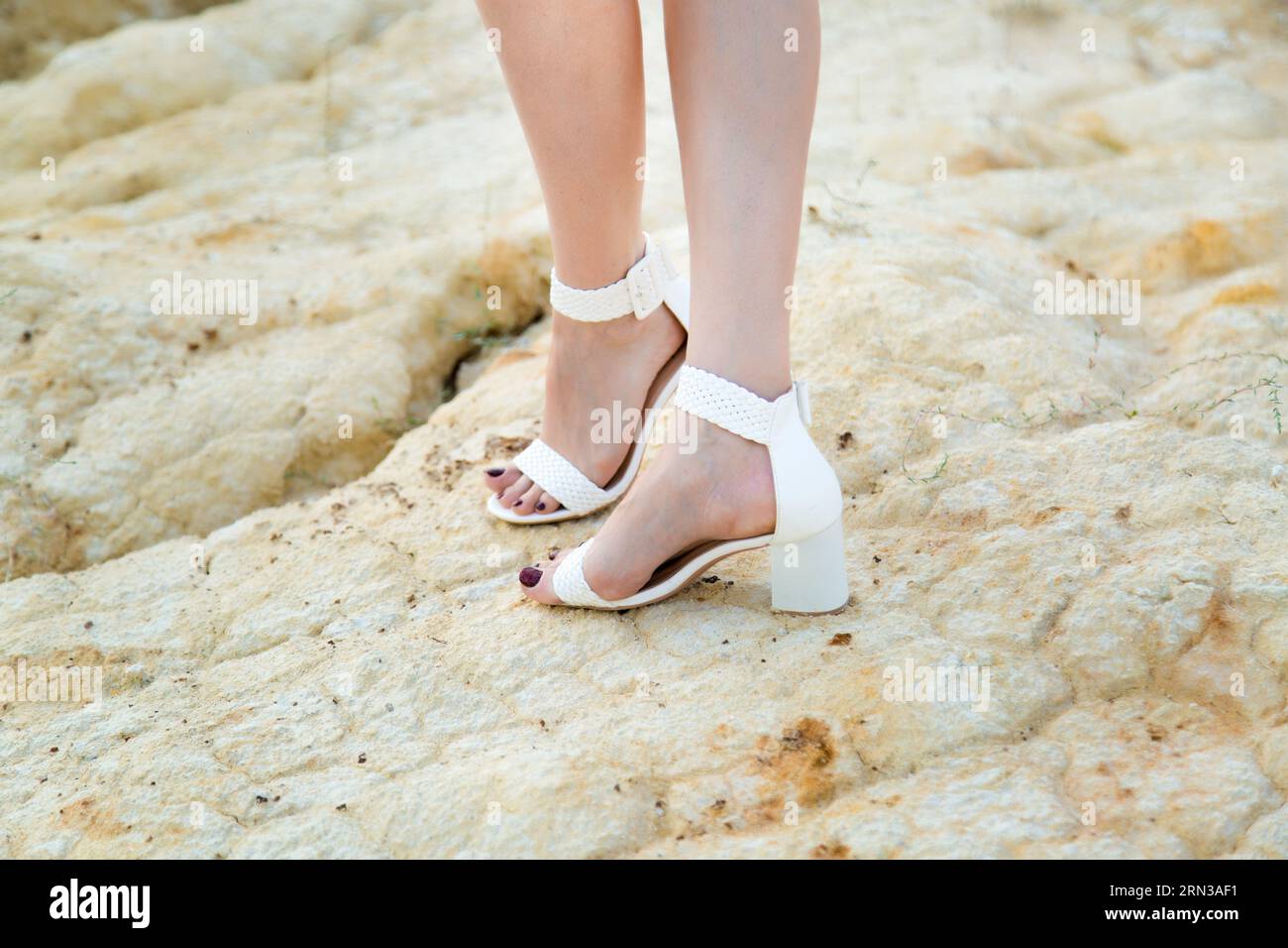 Human feet standing on sand at desert hi-res stock photography and ...