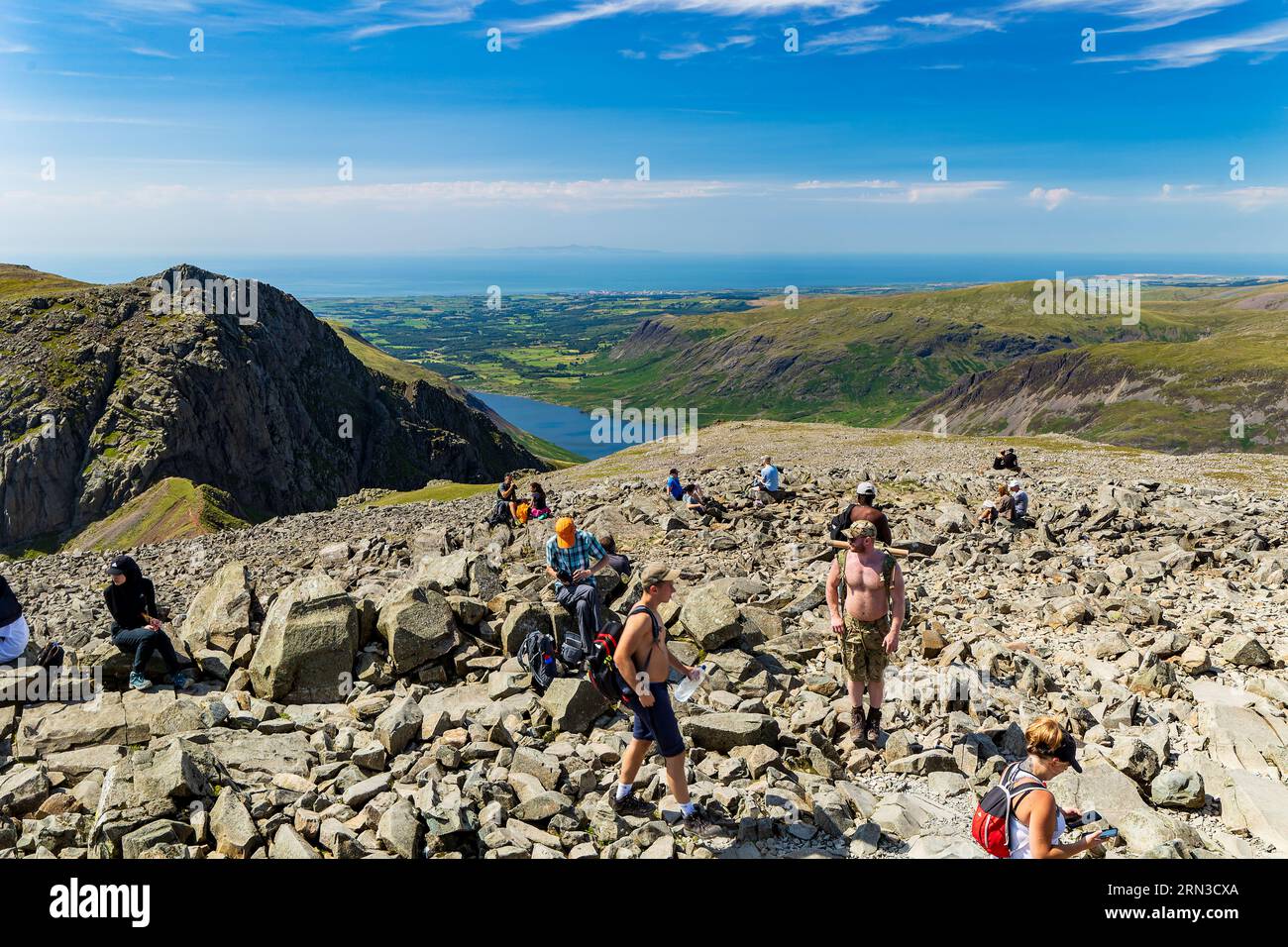 Hikers on the summit of Scafell Pike, England's tallest mountain on a ...