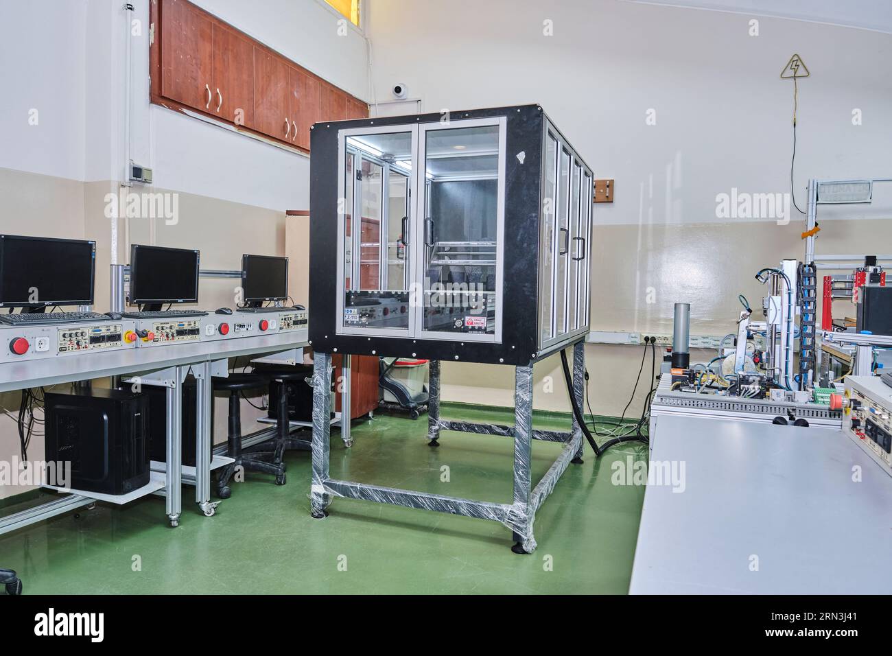 empty computer lab in a university. Computer lab room. room with a lot of computers, desks ...