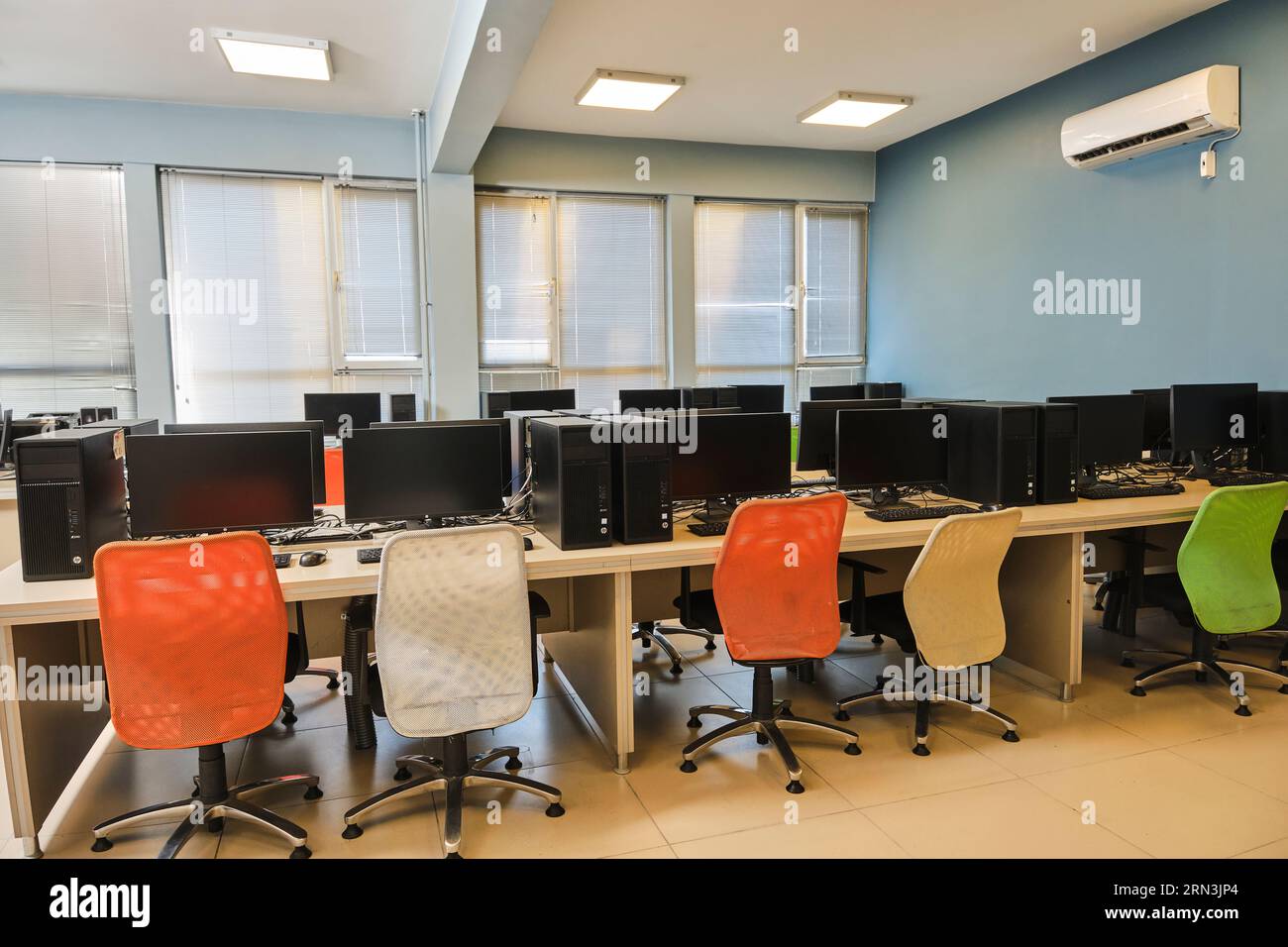 empty computer lab in a university. Computer lab room. room with a lot ...