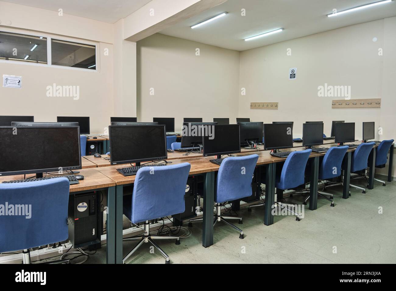 empty computer lab in a university. Computer lab room. room with a lot ...