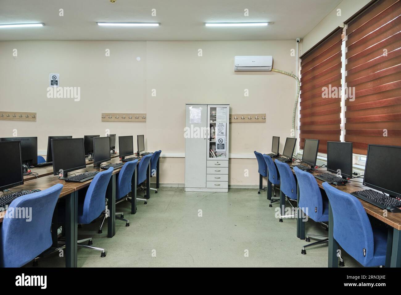 empty computer lab in a university. Computer lab room. room with a lot ...