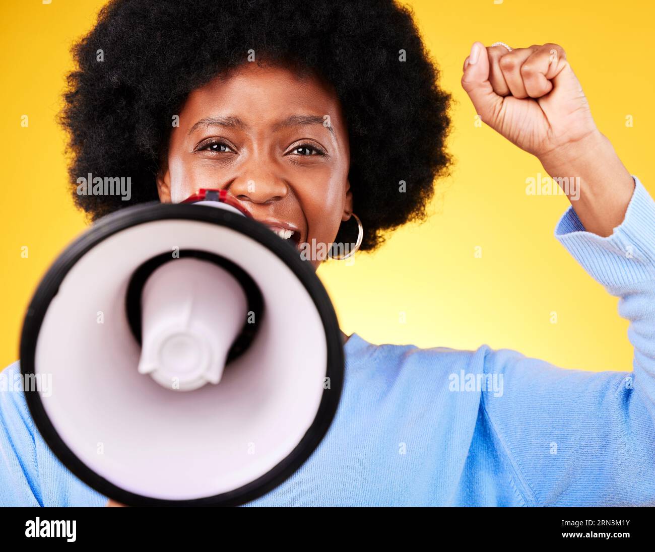 Black woman, portrait and megaphone with fist in protest, fight or ...