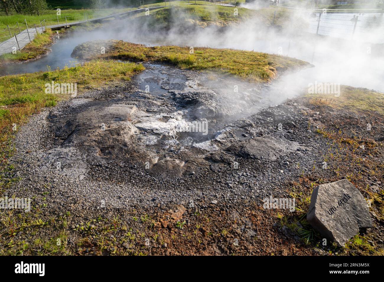 Geothermal Utu geyser source of the Secret Lagoon hot spring pool near ...