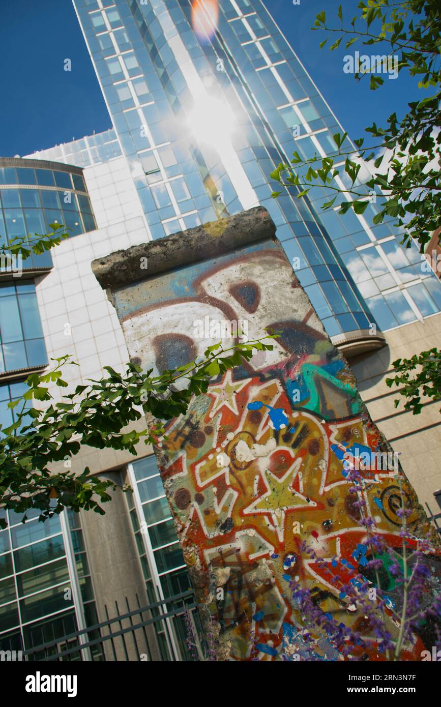 A part of the Berlin Wall with graffiti in Brussels. Situated in a park ...