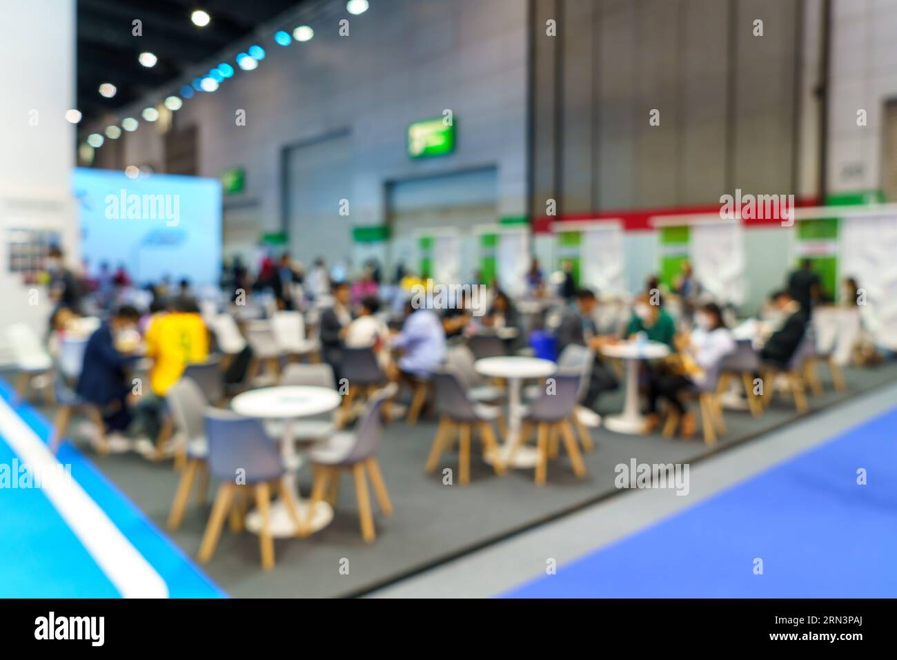 Vibrant symphony of blurred intellect and interaction. The seminar room ...