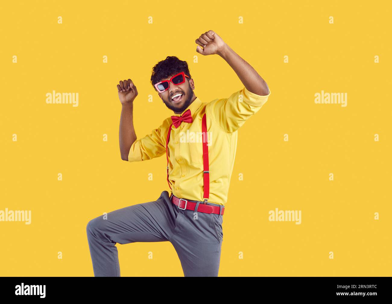 Funny happy young Indian man in party outfit celebrating, dancing and ...