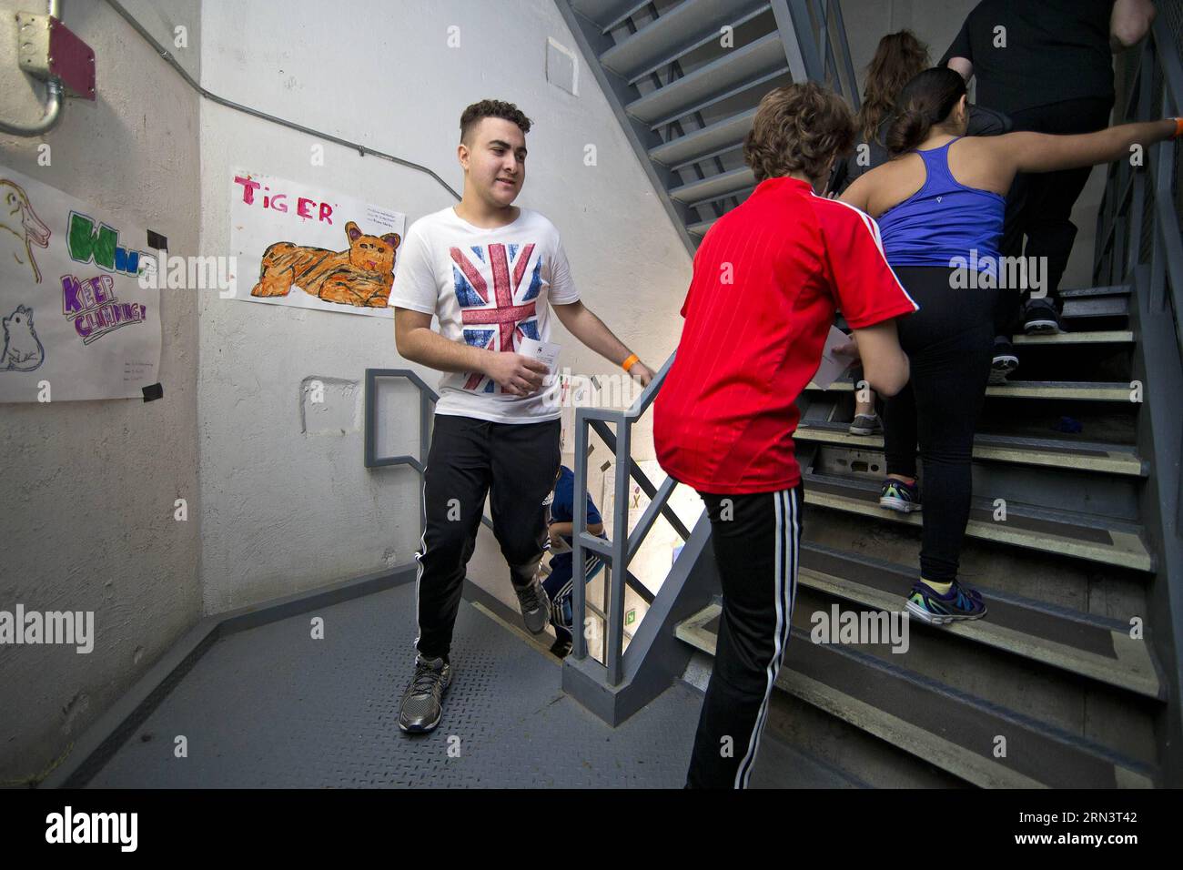 Participants climb the stairs during the 25th Anniversary Canada Life ...