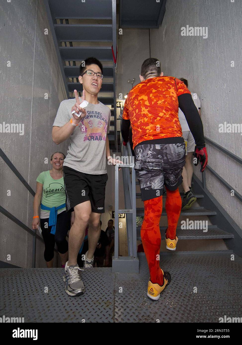 Participants climb the stairs during the 25th Anniversary Canada Life ...