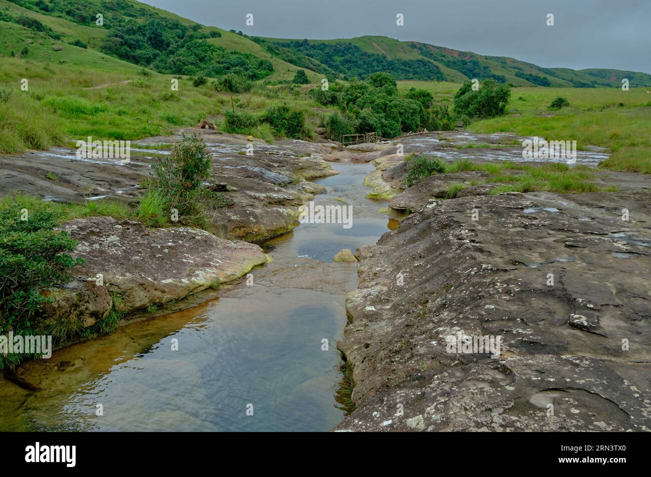 Clear stream through rocky terrain Stock Photo - Alamy
