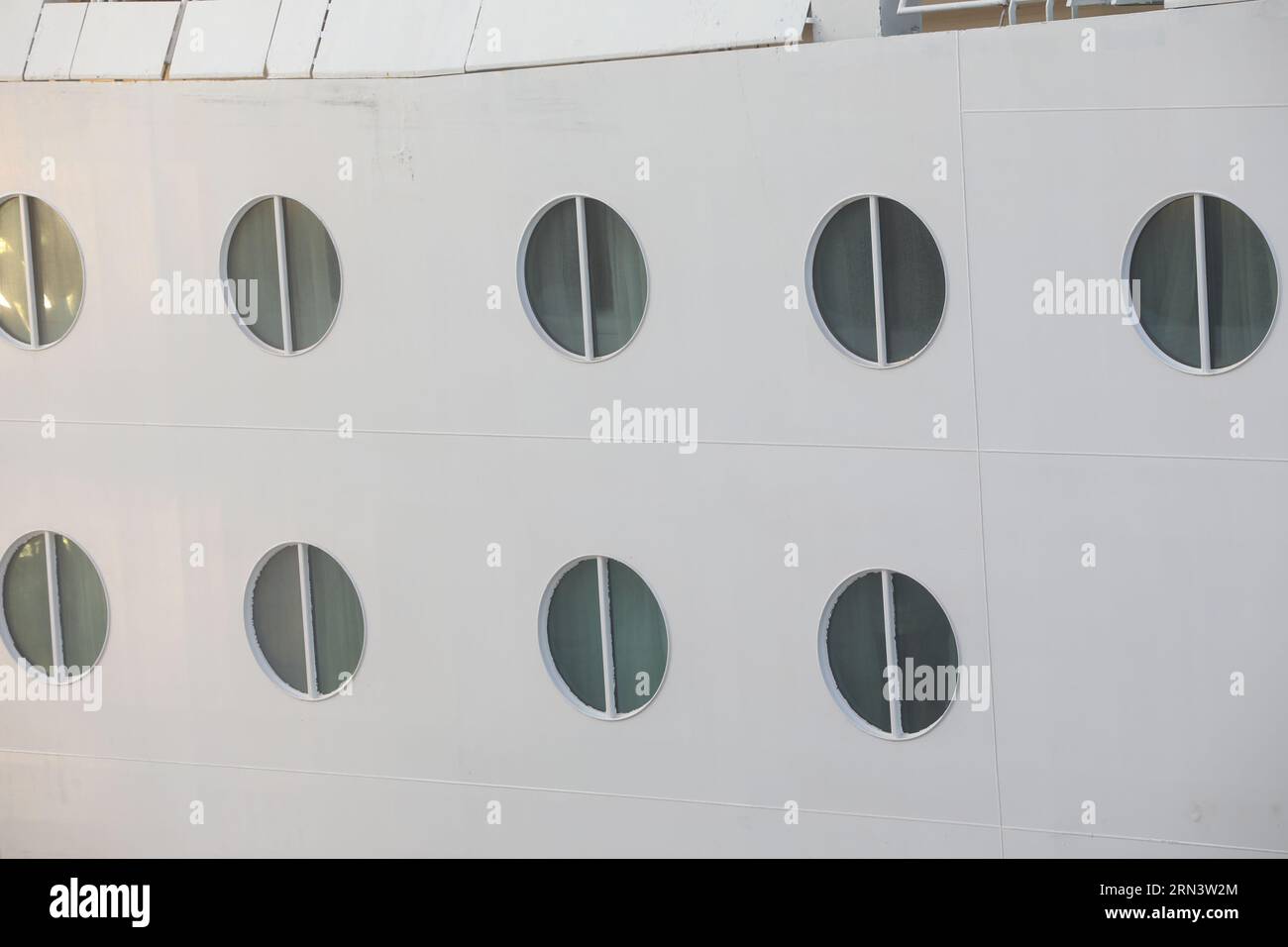 Ship porthole, small windows on ship side Stock Photo - Alamy